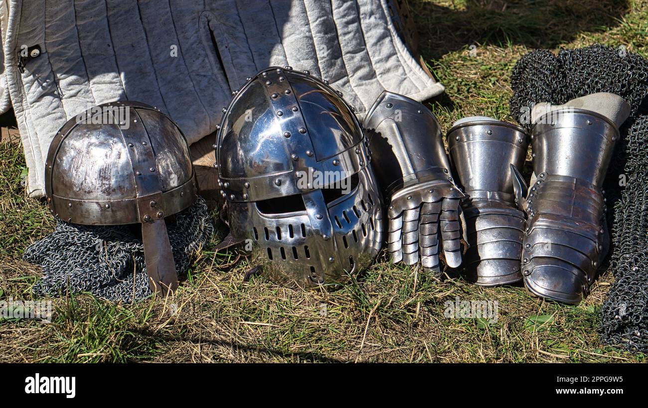 Medieval equipment, helmet, metal glove, armor. Medieval spectacle in ...