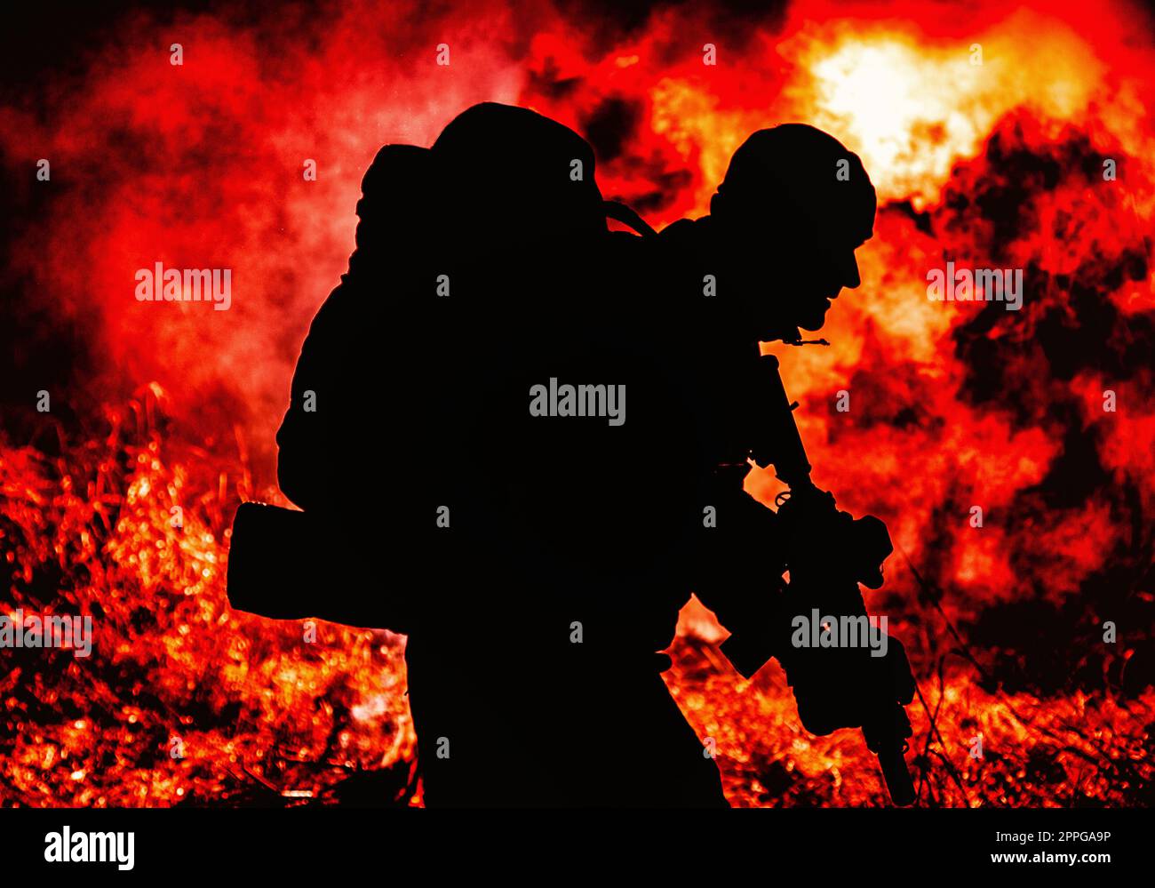 Silhouette of army soldier on burning battlefield Stock Photo - Alamy