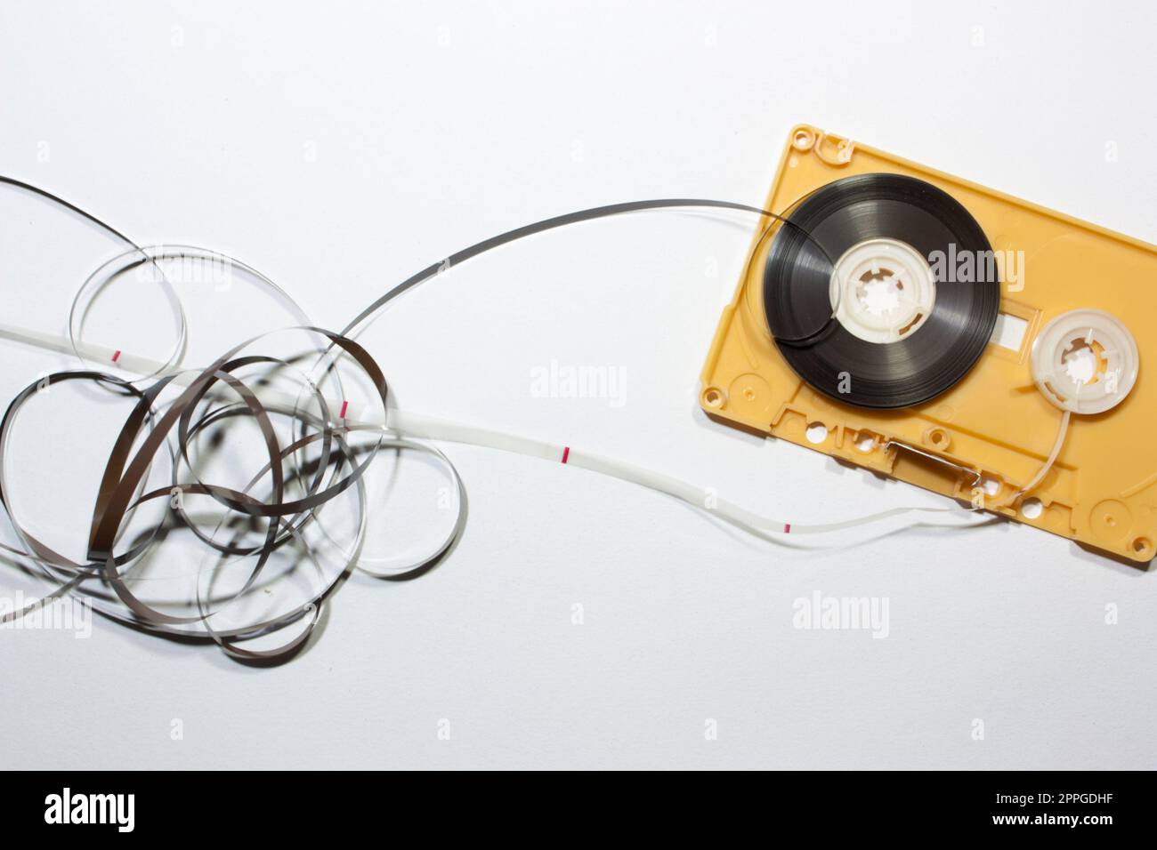 parts of cassette tape on white background Stock Photo - Alamy