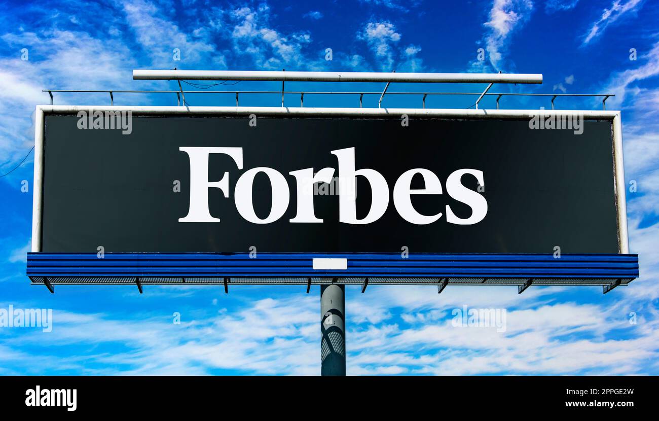 Advertisement billboard displaying logo of Forbes Stock Photo - Alamy
