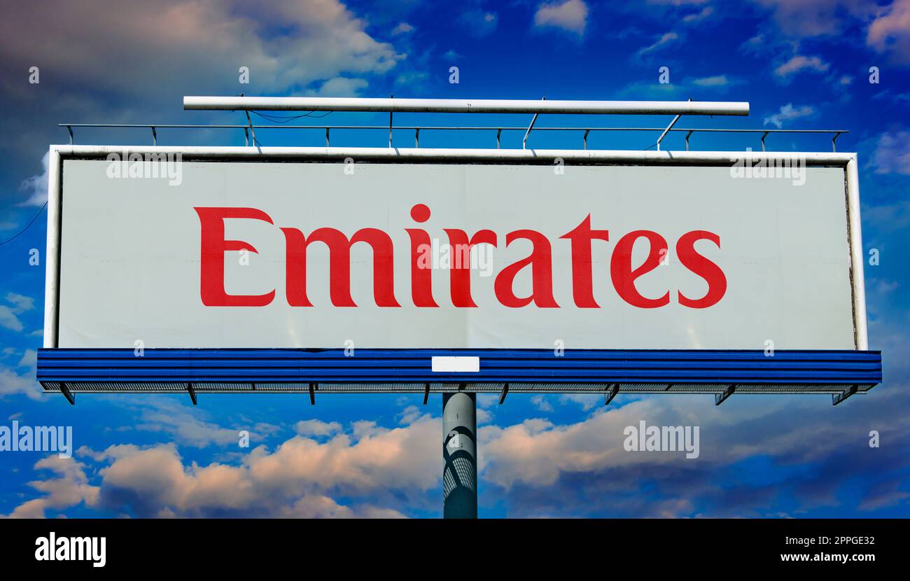 Advertisement billboard displaying logo of Emirates Stock Photo - Alamy