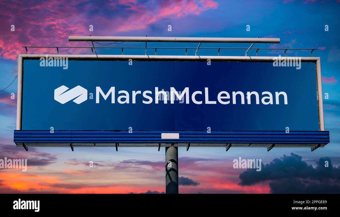 Advertisement billboard displaying logo of Marsh McLennan Stock Photo ...