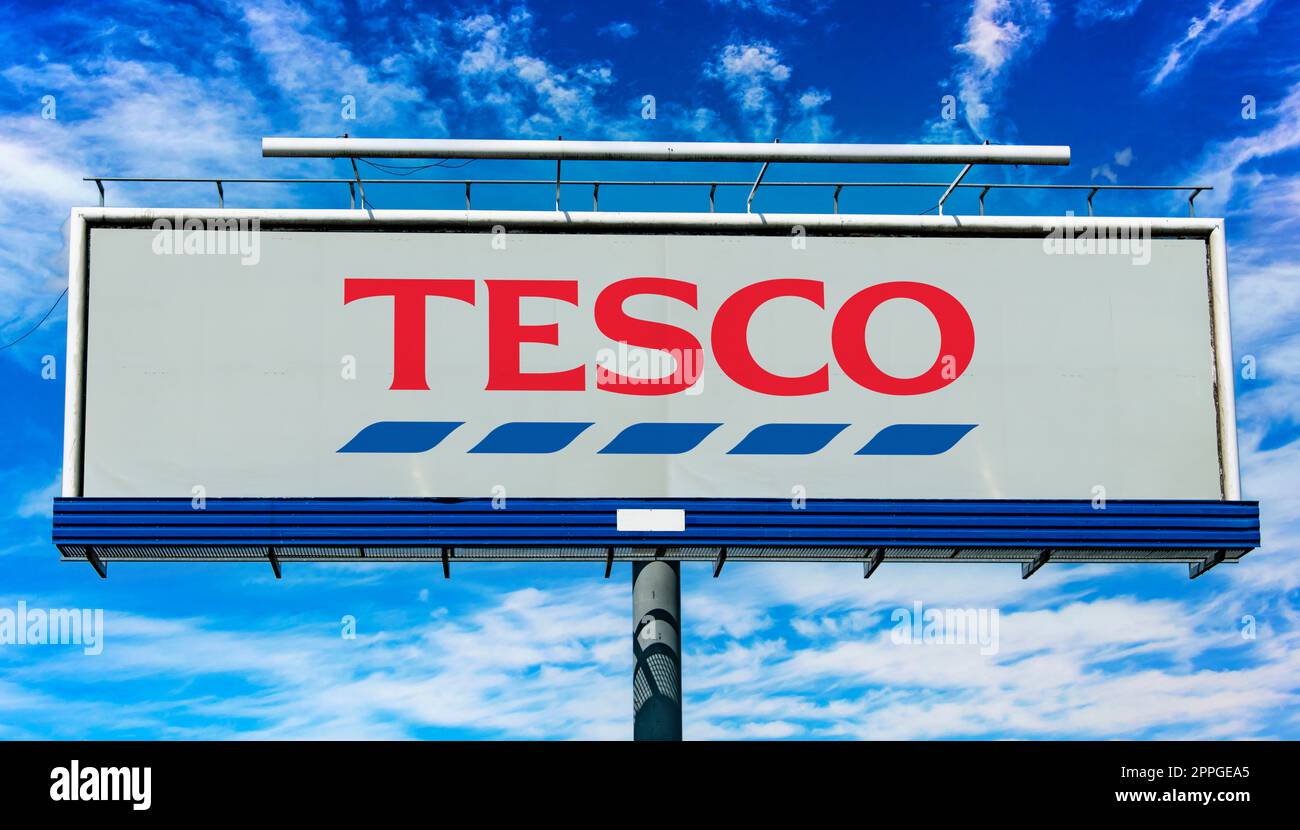 Advertisement billboard displaying logo of Tesco Stock Photo - Alamy
