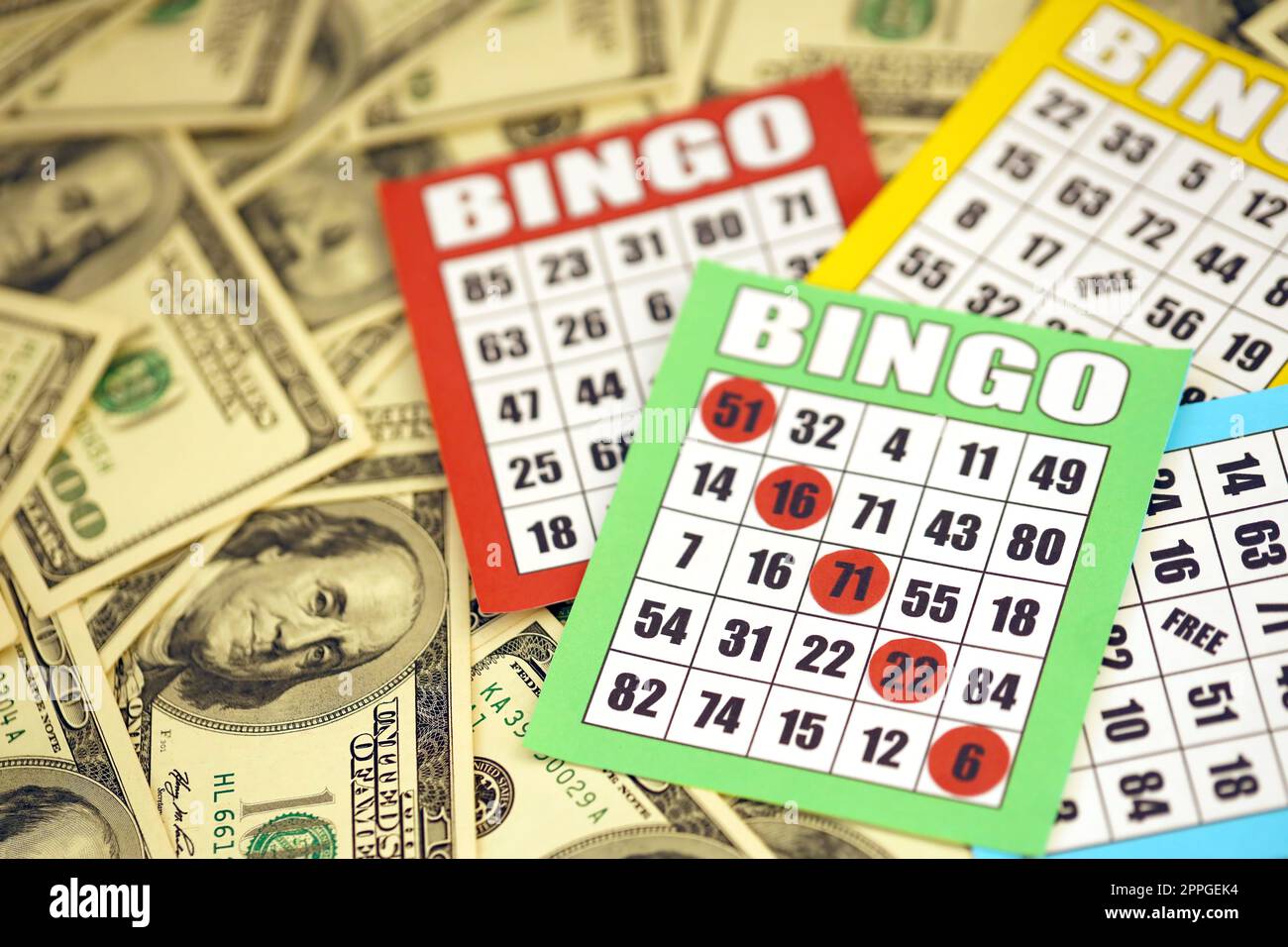 Many bingo boards or playing cards for winning chips and big amount of ...