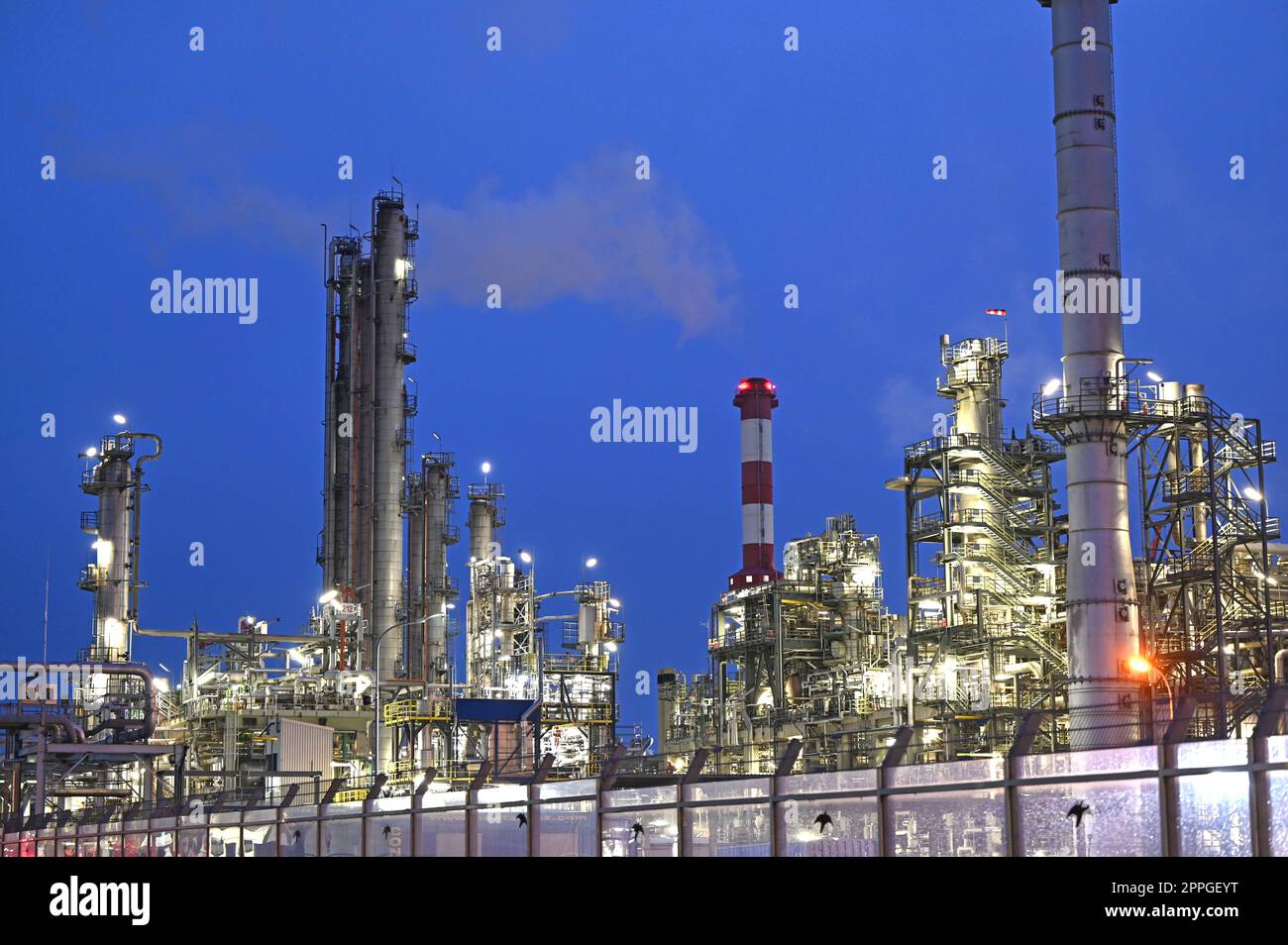 OMV refinery in Schwechat at night Stock Photo - Alamy