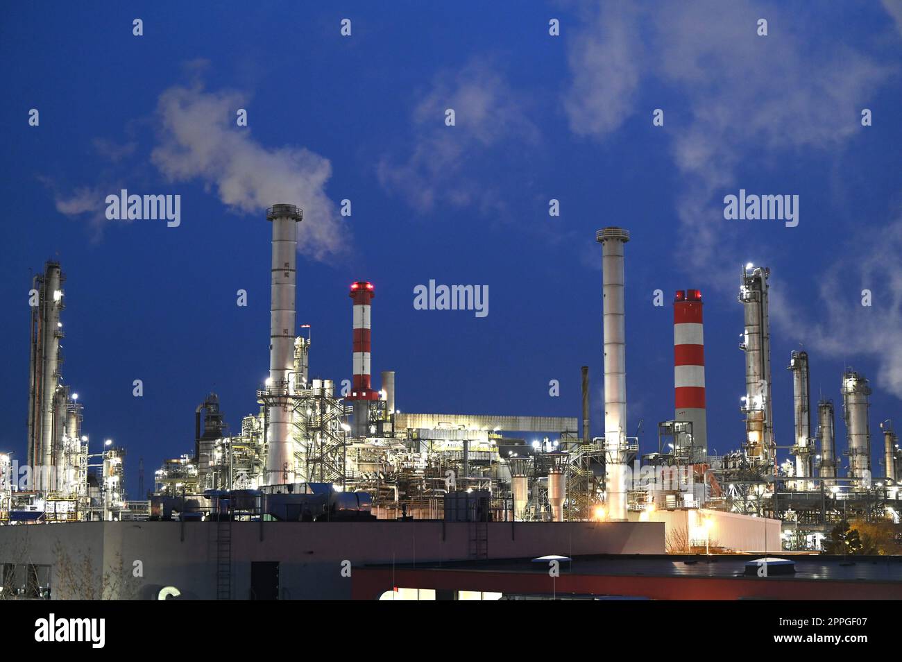 OMV refinery in Schwechat at night Stock Photo - Alamy