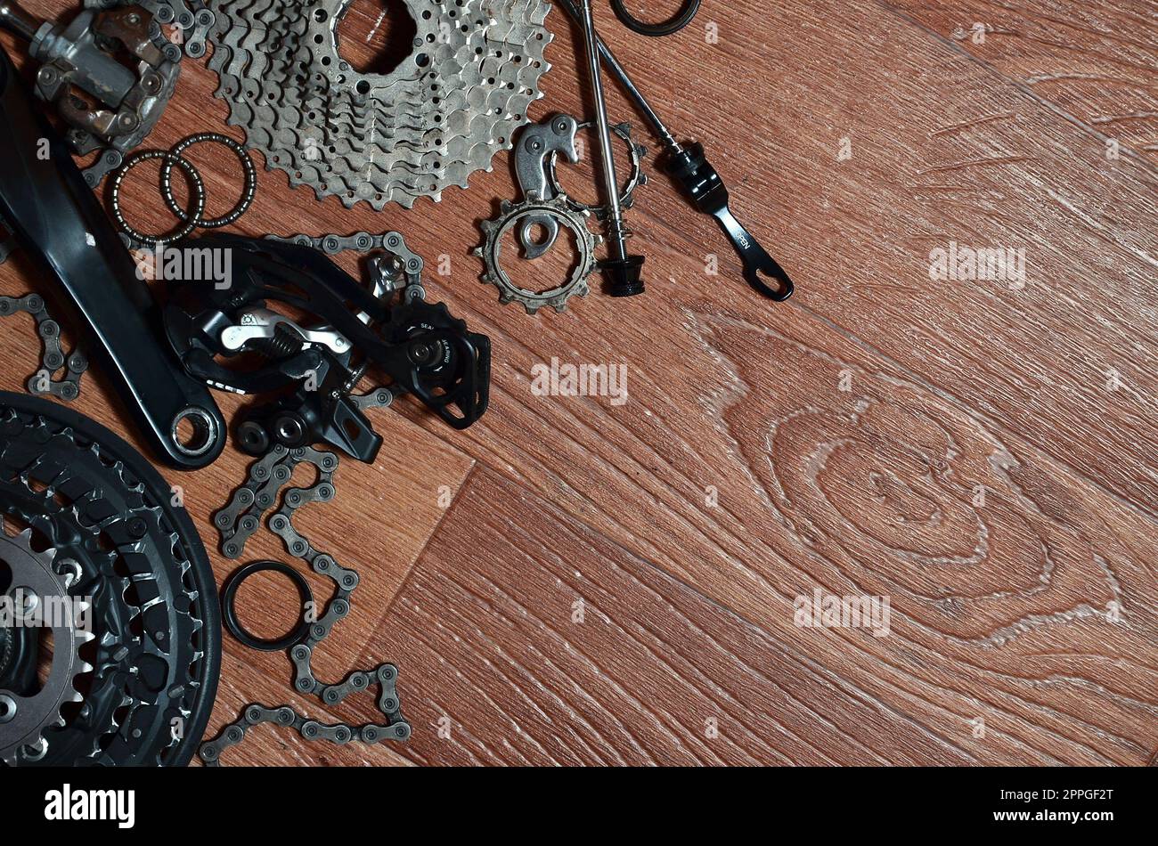 Many different metal parts and components of the running gear of a ...