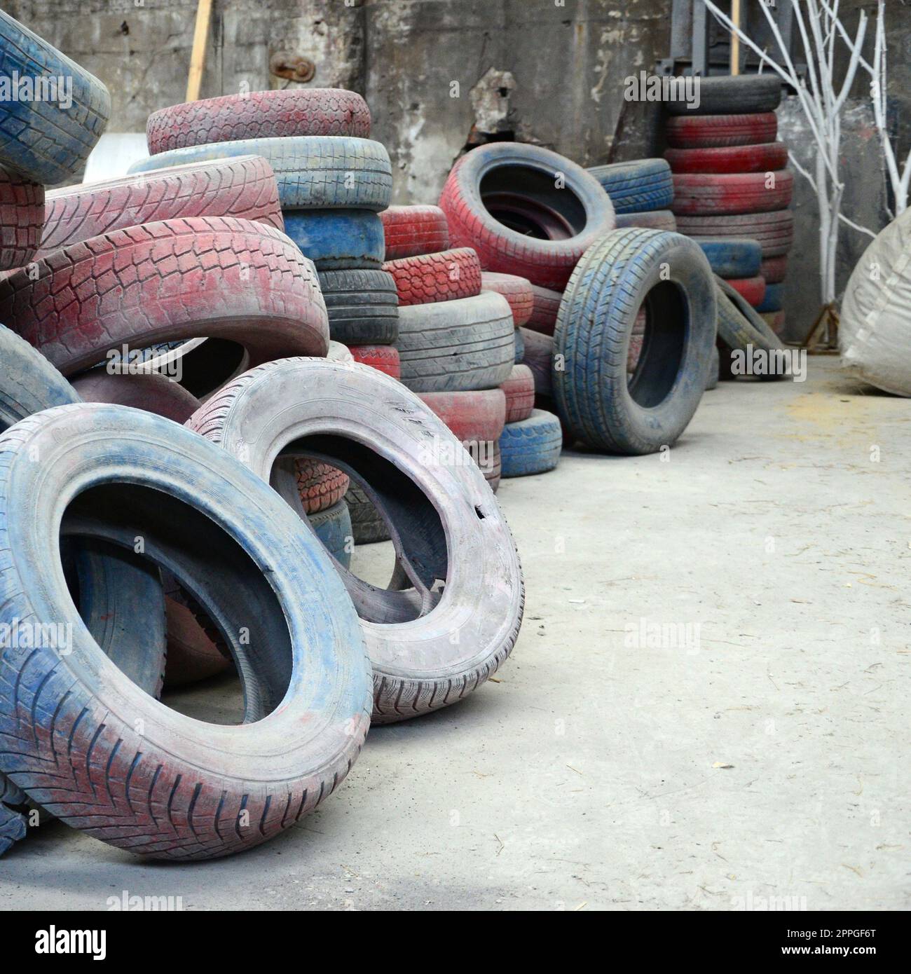 A picture of many old used tires left on a waste dump Stock Photo - Alamy
