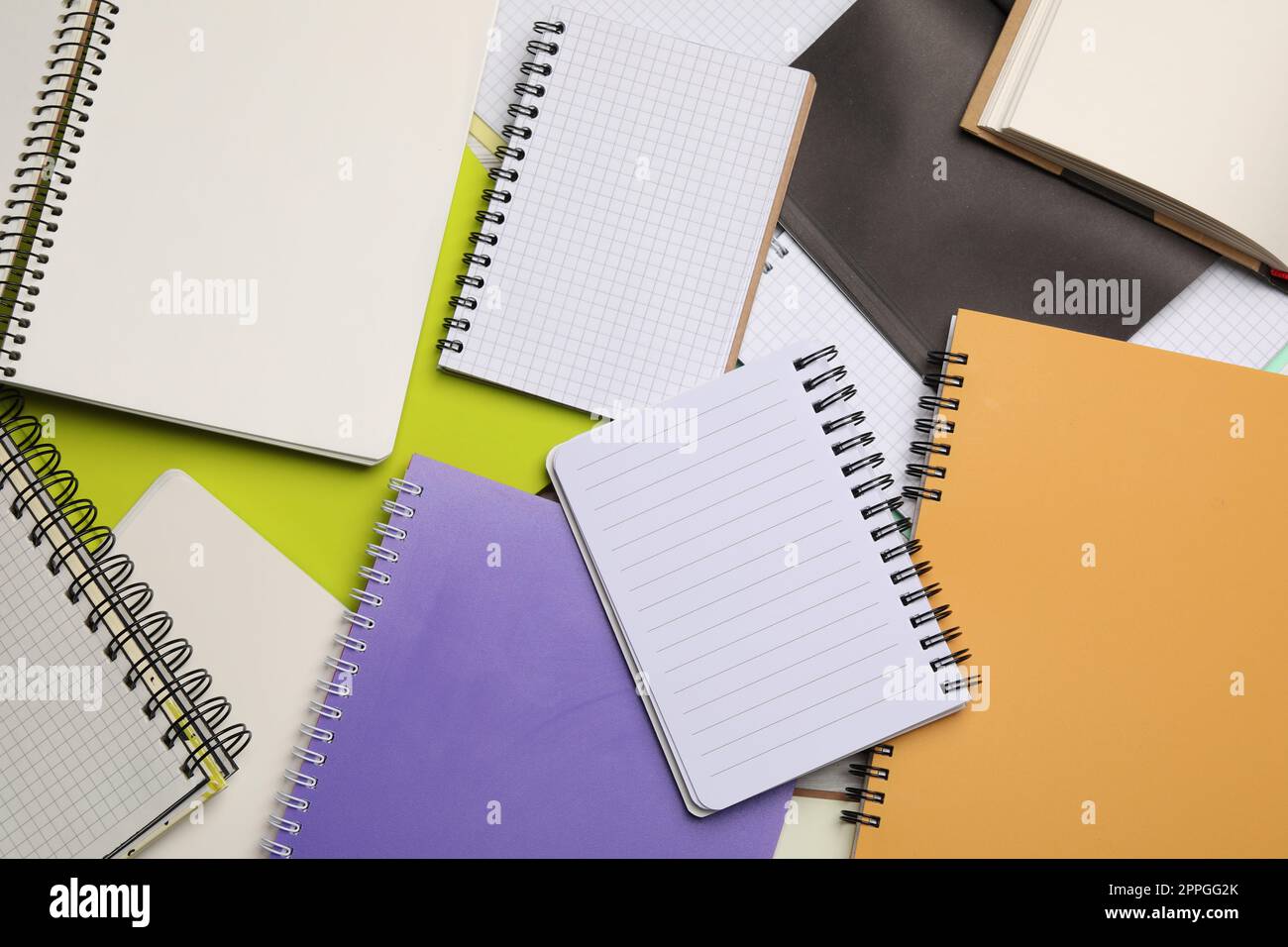 Many different notebooks as background, top view Stock Photo - Alamy