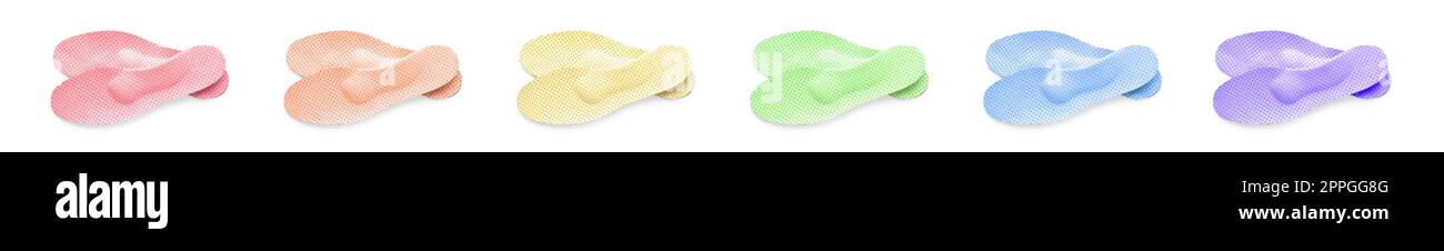 Set with colorful orthopedic insoles on white background, top view ...