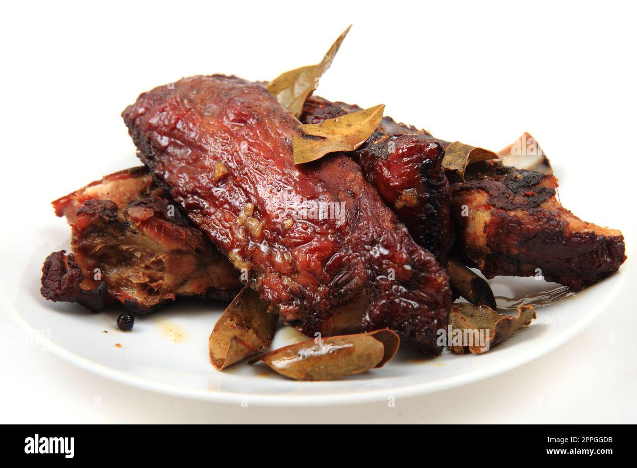 smoked pig ribs isolated on the white background Stock Photo - Alamy