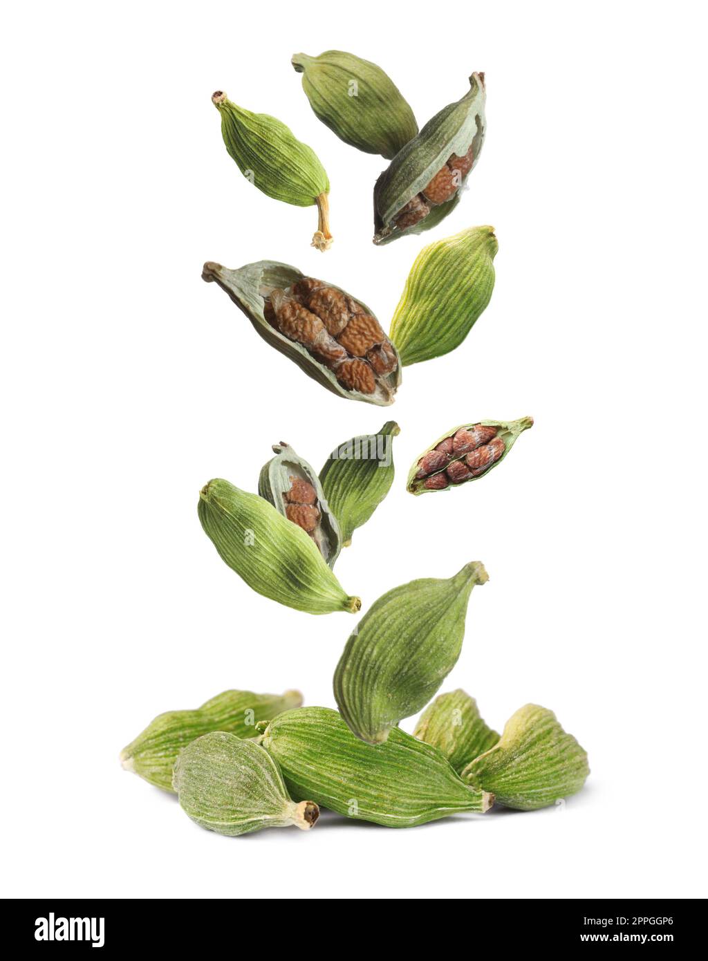 Dry green cardamom pods with seeds falling on white background Stock ...