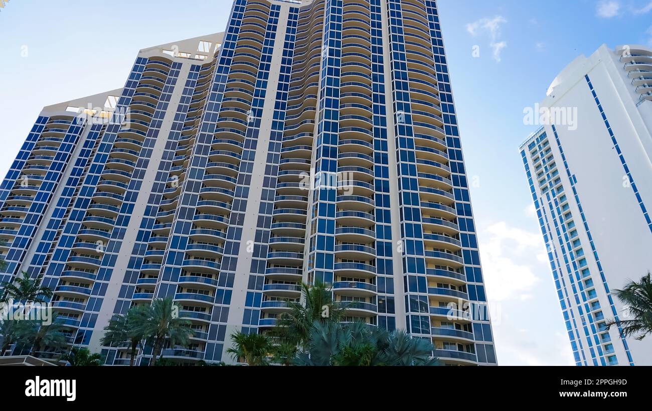 Modern apartment buildings with palm trees at Avenue at Miami, Usa ...