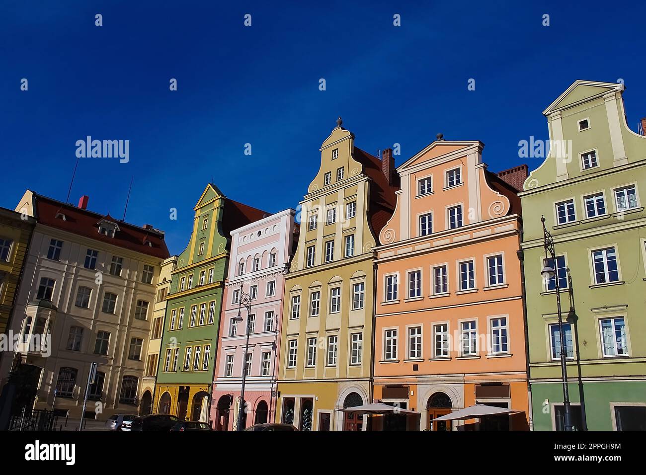 old town hall building with a clock in the center on Wroclaw Square ...