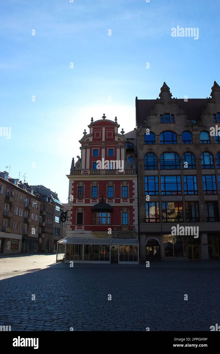 old town hall building with a clock in the center on Wroclaw Square ...