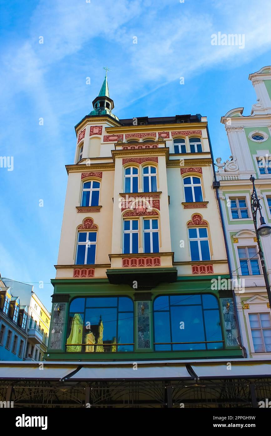 old town hall building with a clock in the center on Wroclaw Square ...
