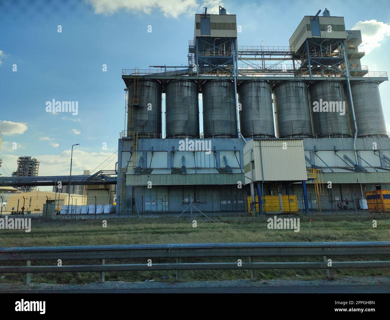 Oil storage tank terminal and tanker, petrol industrial zone shot from ...