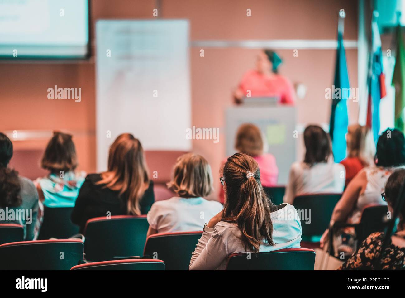 Woman giving presentation on business conference event Stock Photo - Alamy