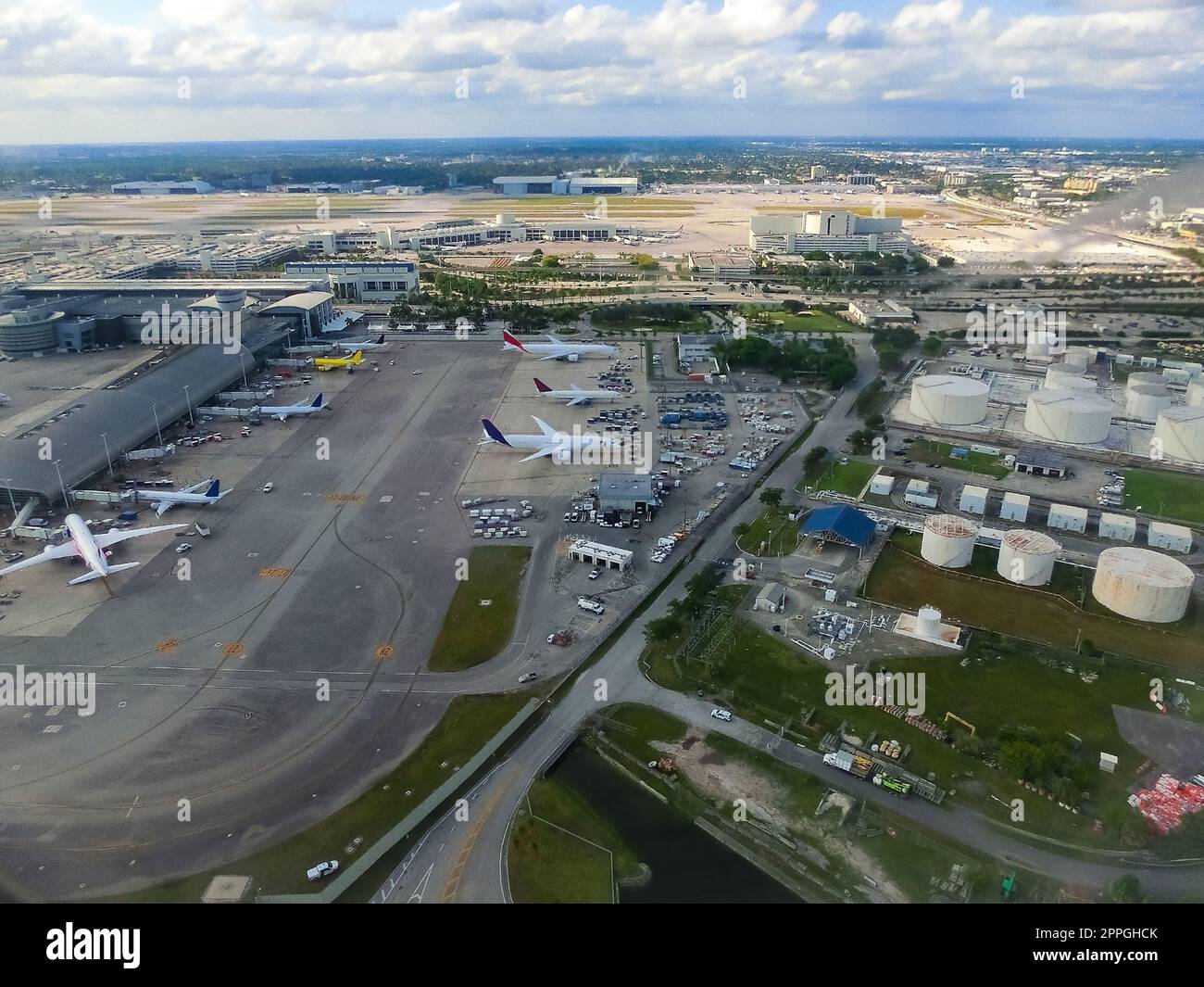 Miami from airplane porthole at day with blue sky Stock Photo - Alamy
