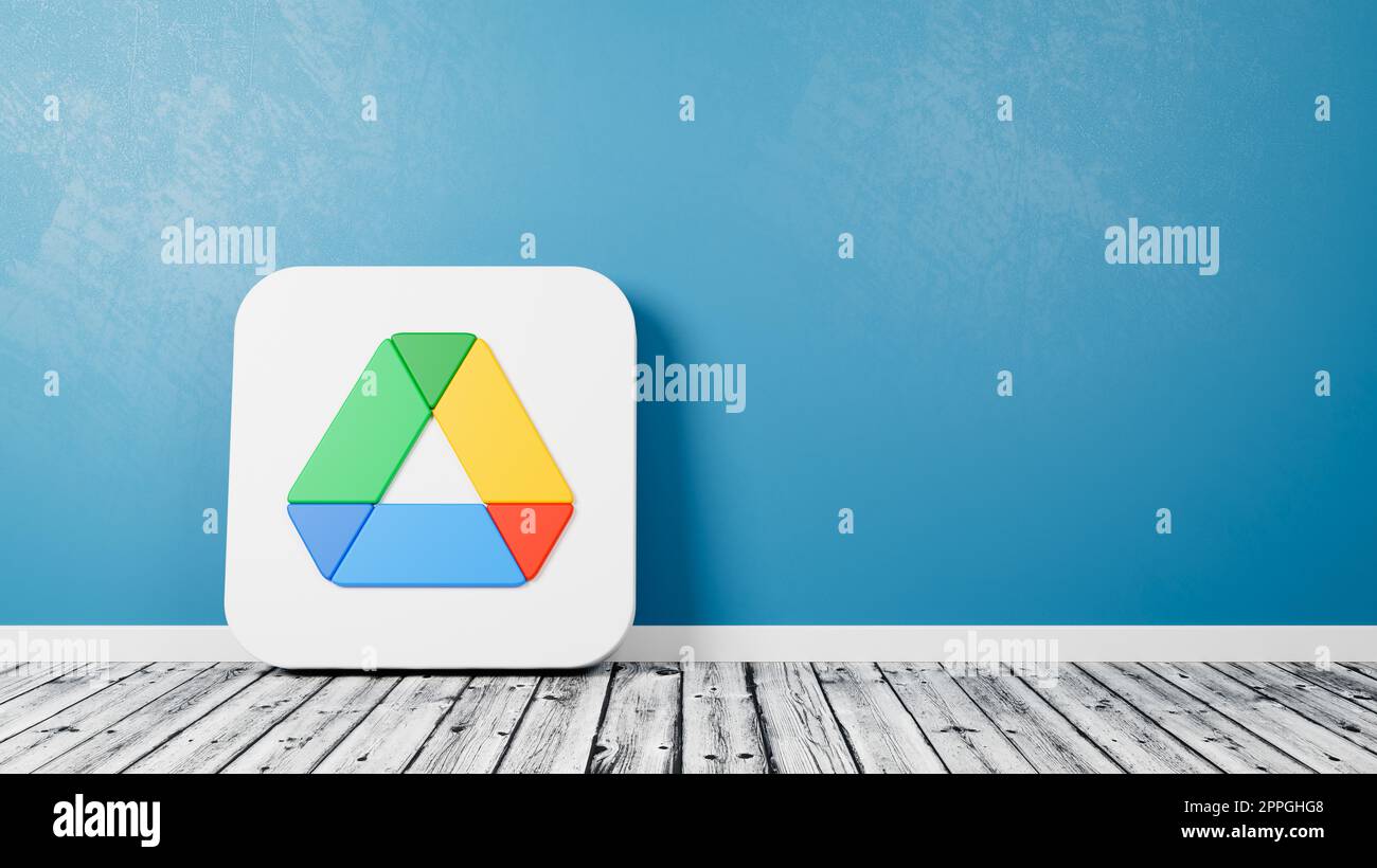 Google Drive App Logo on Wooden Floor Against Wall Stock Photo - Alamy