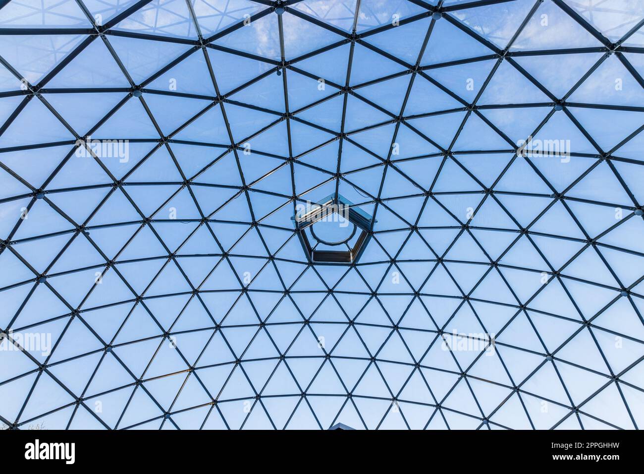 Structural glass facade curving roof of modern architectural building ...