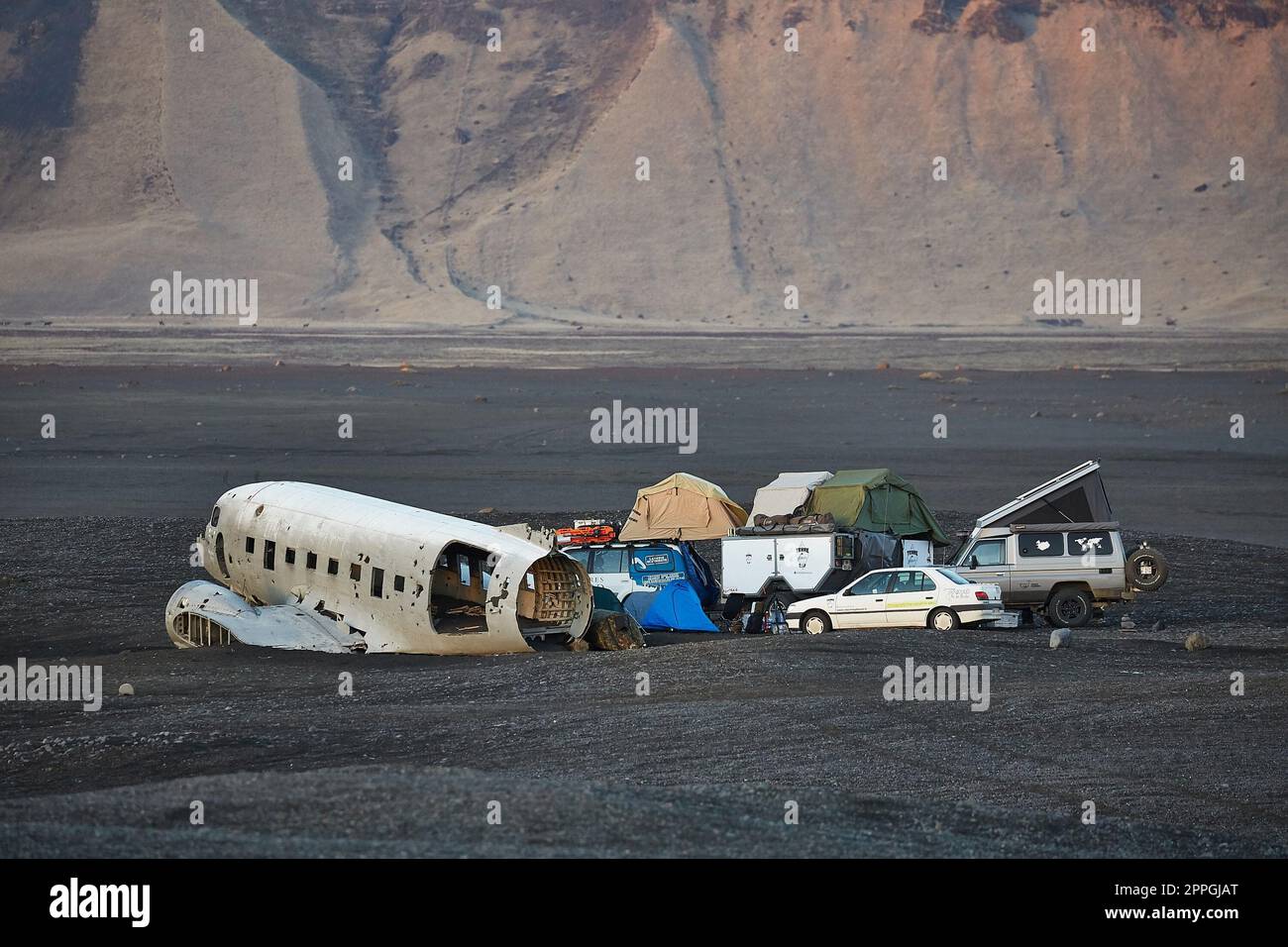 Plane wreck in Iceland, with expedition camping around Stock Photo - Alamy
