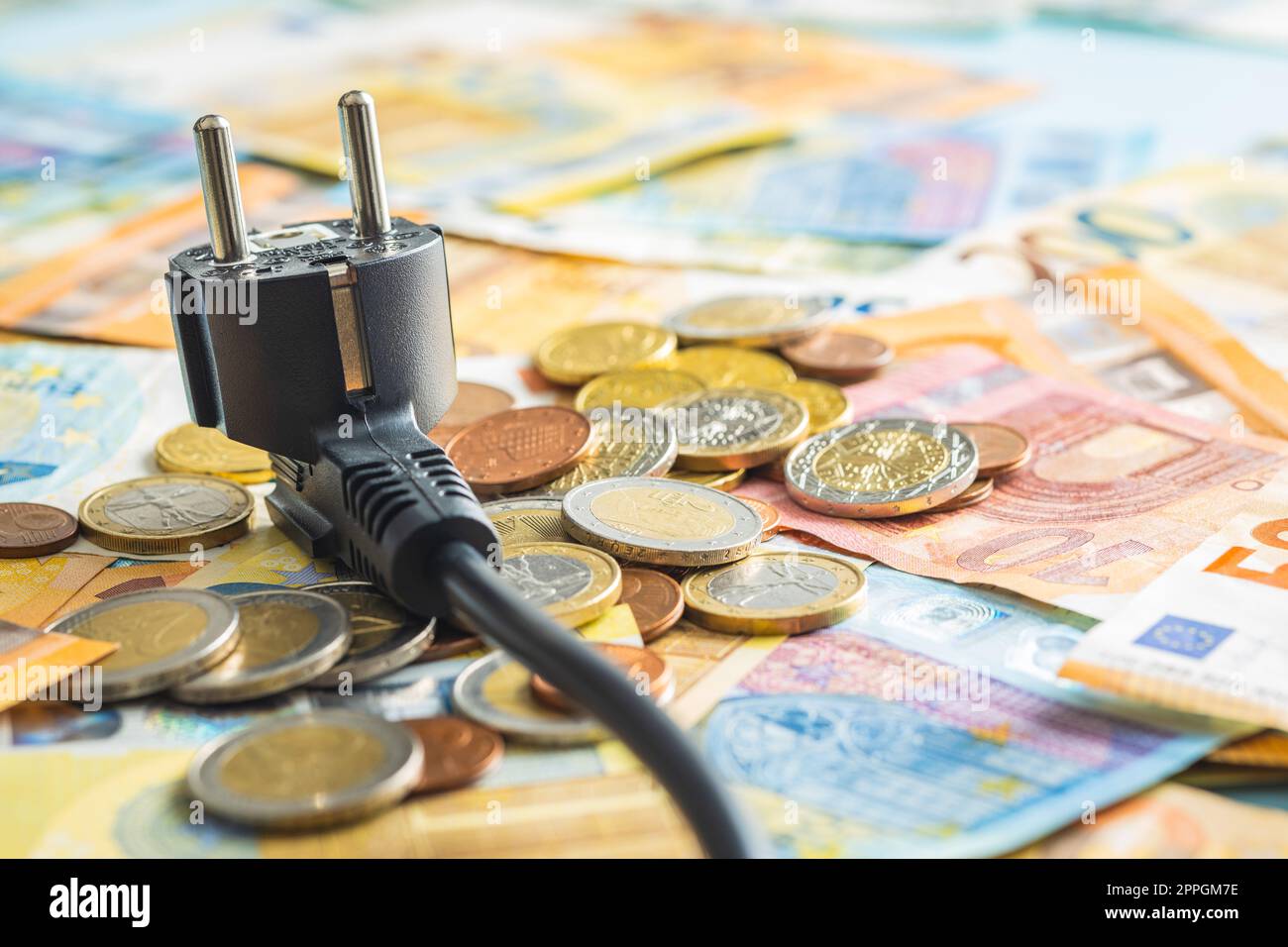 Electric plug and euro money. Concept of increasing electricity prices ...