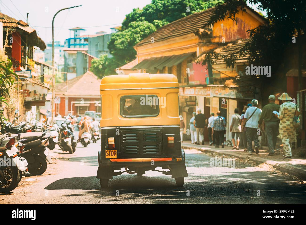 Panaji, Goa, India. Yellow Auto Rickshaw Or Tuk-tuk Moving On Street In ...