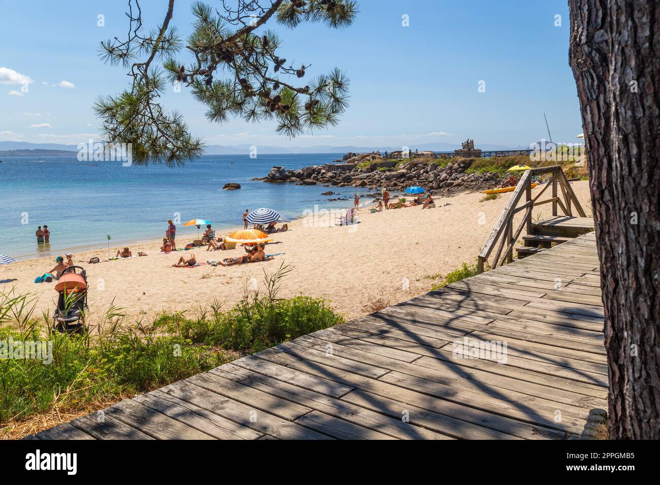 People in Galicia beach Stock Photo - Alamy