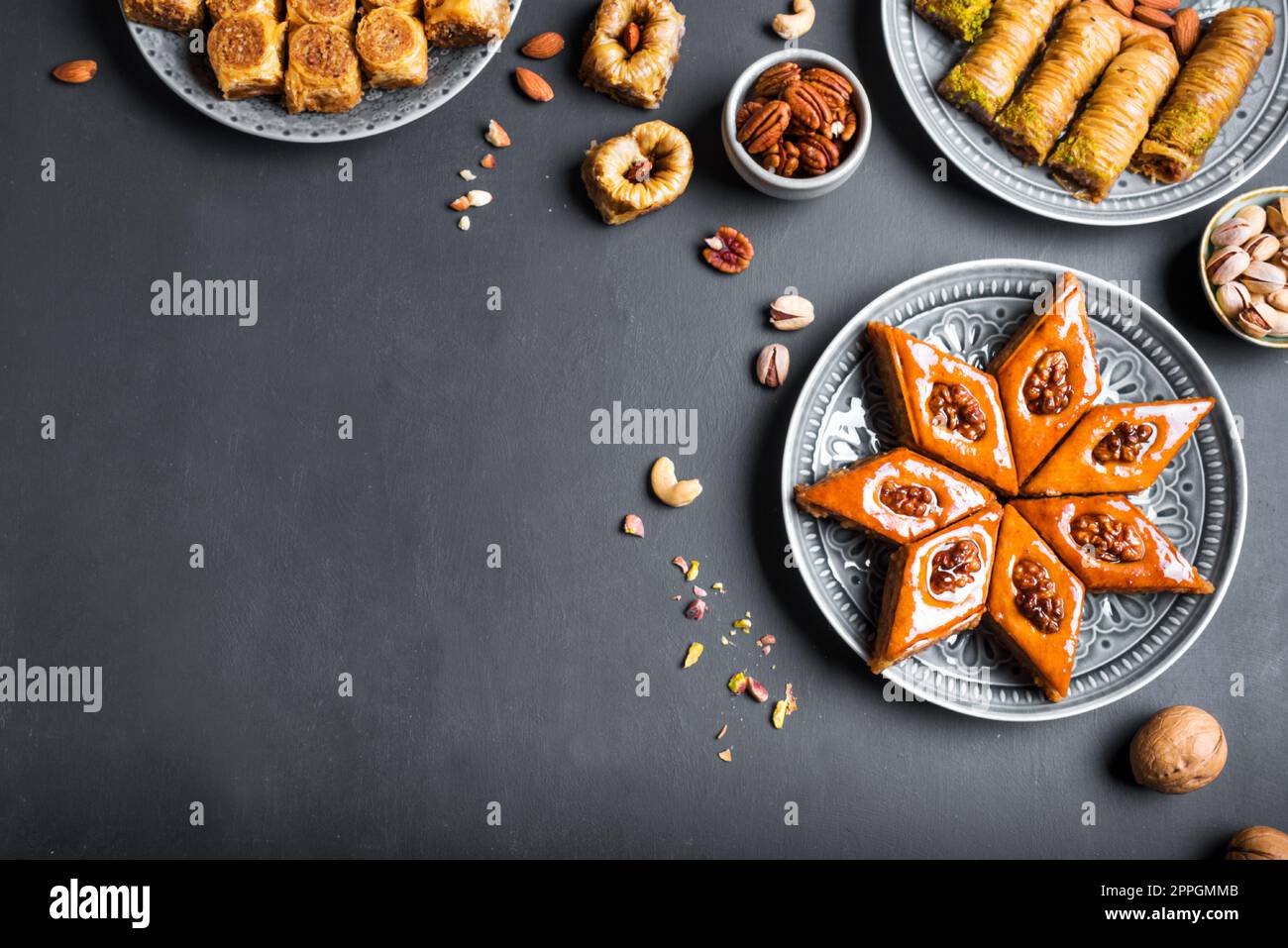 Arabian Baklava with nuts and honey on dark background, copy space, top ...