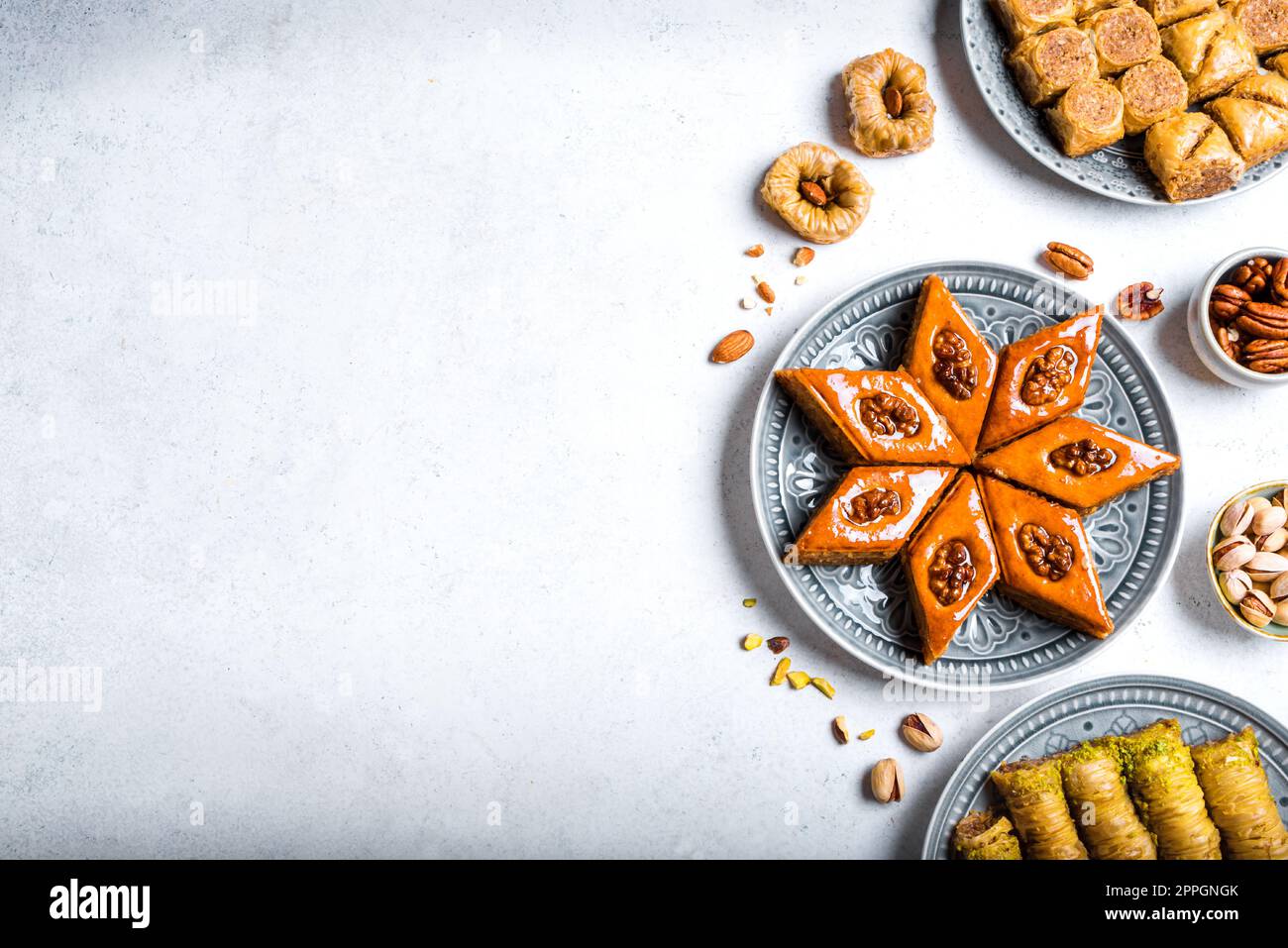 Arabic Baklava with nuts and honey on white background, copy space, top ...