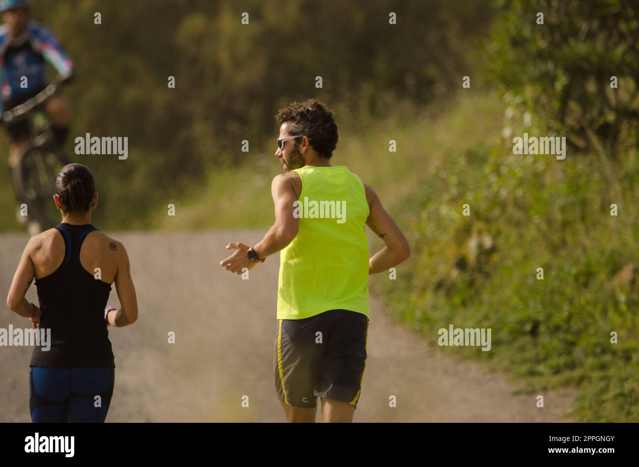 Man and woman running people hi-res stock photography and images - Alamy