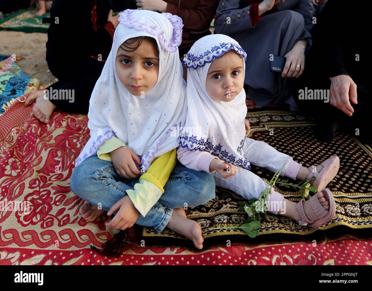Palestinians perform Eid al-Fitr prayers at sunrise in Khan Yunis in ...