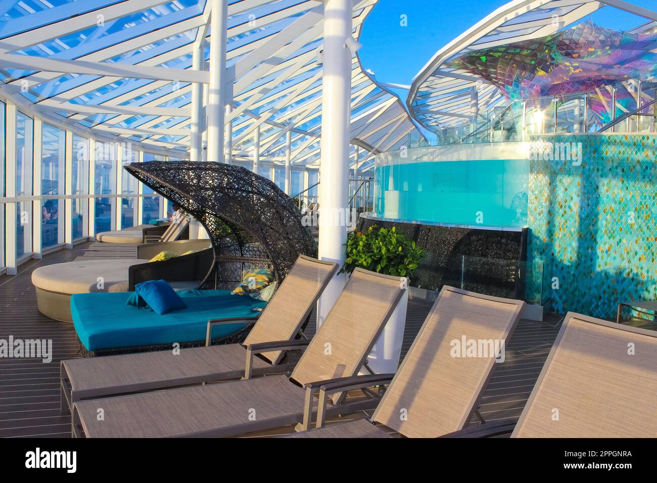 Miami, USA - April 29, 2022: Solarium with pools, bars at Symphony of the seas is the biggest ...