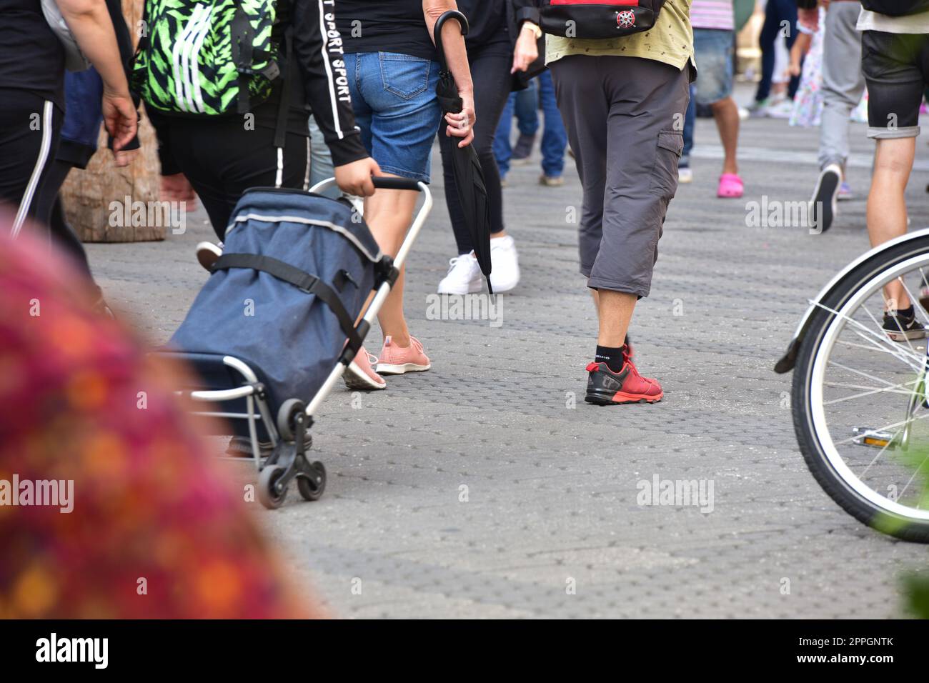 Street scene with many people walking Stock Photo - Alamy