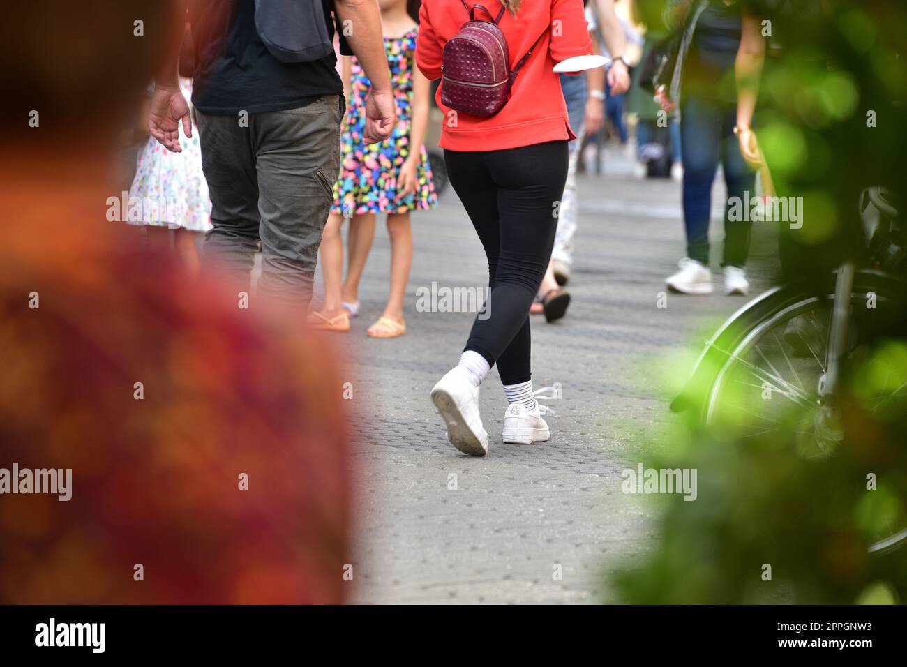 Street scene with many people walking Stock Photo - Alamy