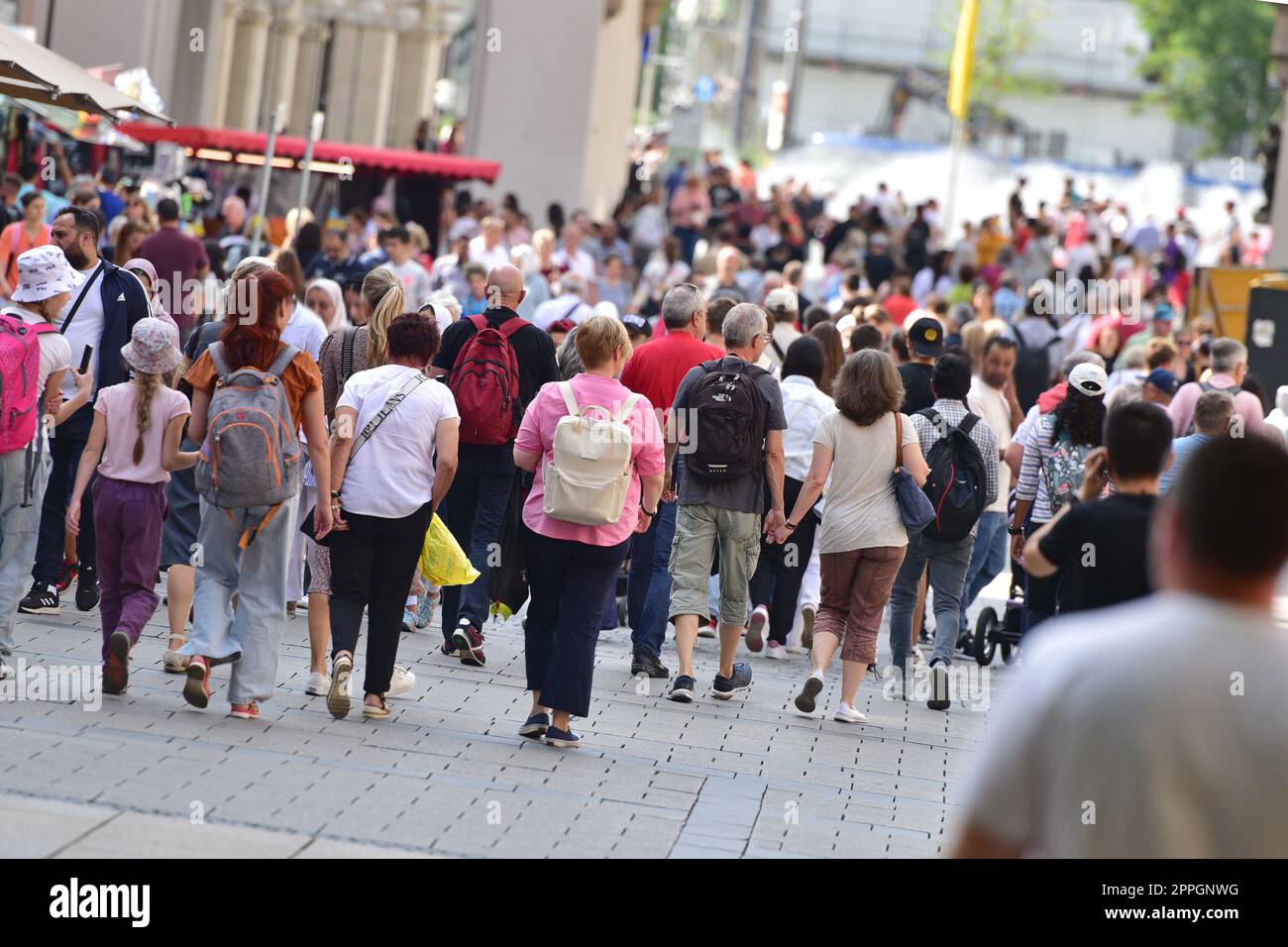 Street scene in Munich with many people walking Stock Photo - Alamy