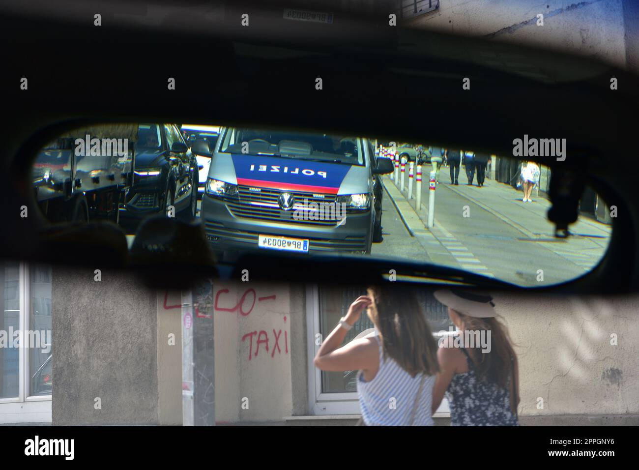 Police car in the rearview mirror Stock Photo - Alamy