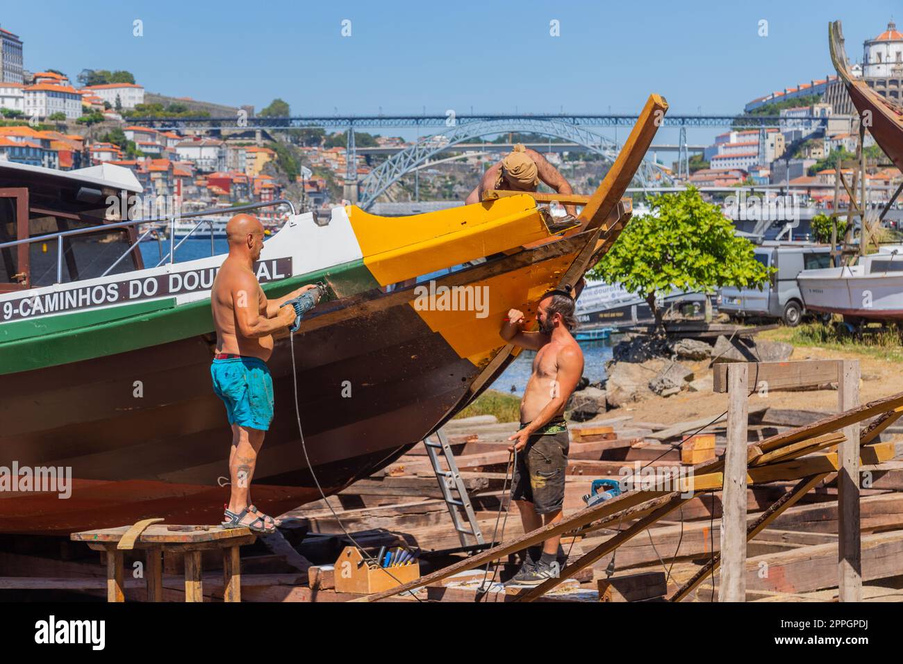 Men working in the boats Stock Photo - Alamy
