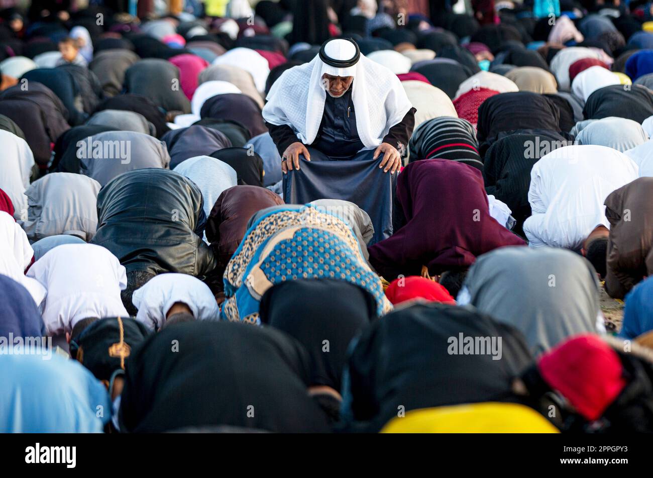 Palestinians perform Eid al-Fitr prayers at sunrise in Khan Yunis in ...