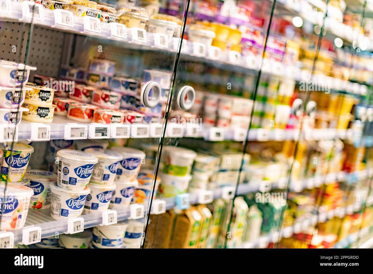 Food products displayed in a commercial refrigerator Stock Photo - Alamy