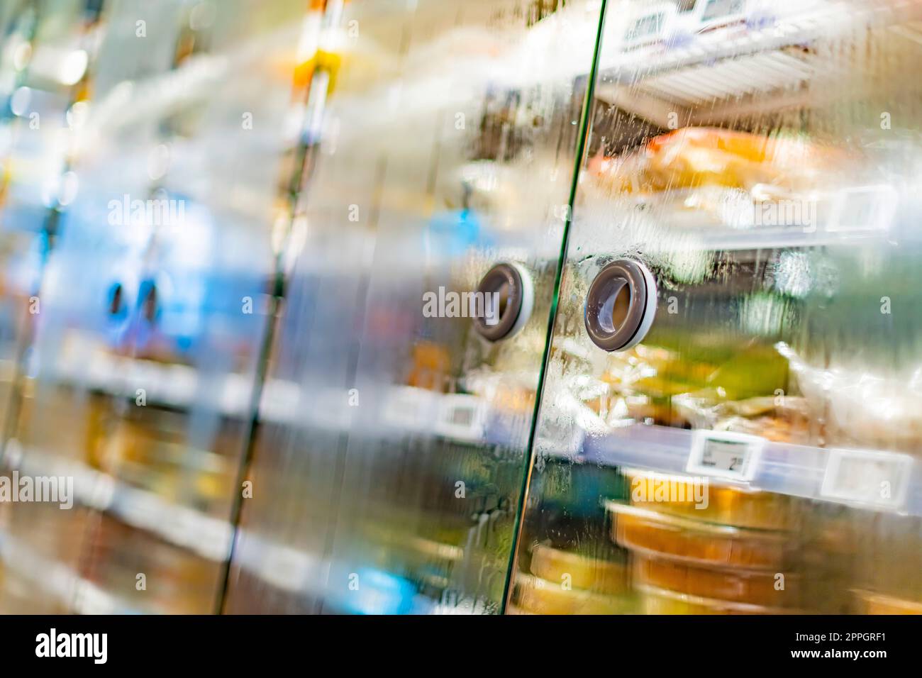 Food products displayed in a commercial refrigerator Stock Photo - Alamy
