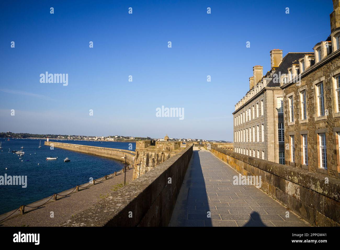 Saint-Malo lighthouse and pier view from the city fortifications ...