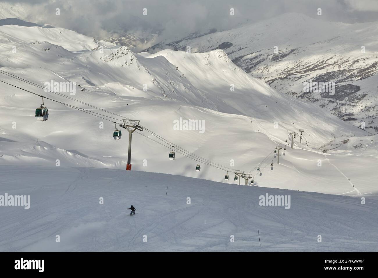 Ski lift cabin in snowy mountain landscape Stock Photo - Alamy
