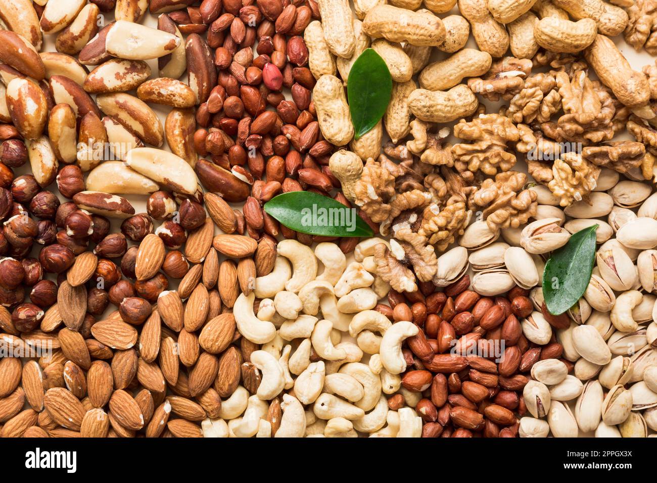 different nuts frame background. Close up, top view, flat lay with vopy space. Walnut ...