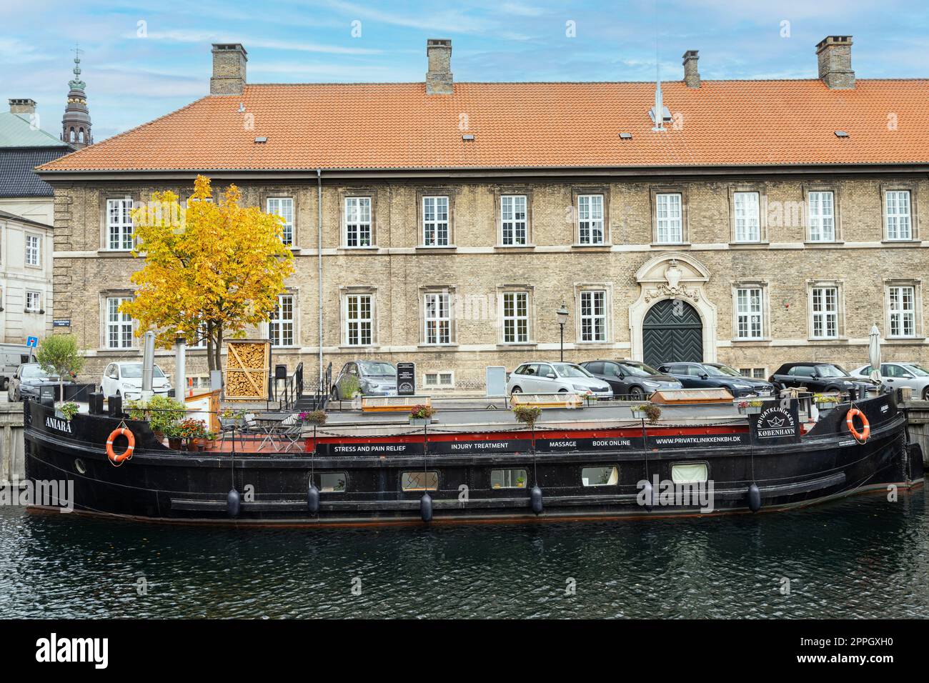 Old wooden boat on the Fredericsholms Kanal in Copenhagen, Denmark ...