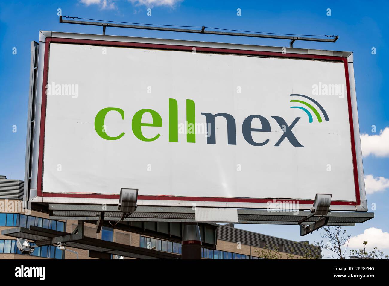 Advertisement billboard displaying logo of Cellnex Telecom Stock Photo ...