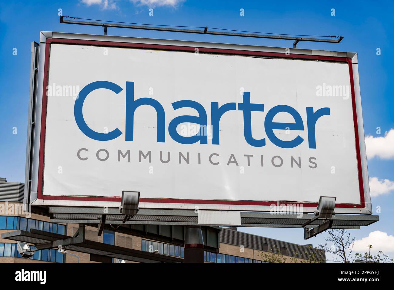 Advertisement billboard displaying logo of Charter Communication Stock ...