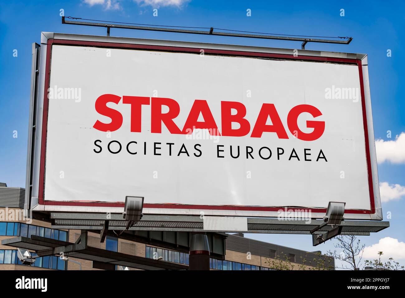 Advertisement billboard displaying logo of STRABAG Stock Photo - Alamy