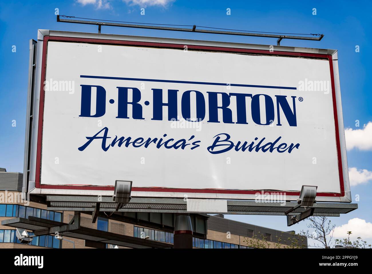 Advertisement billboard displaying logo of D.R. Horton Stock Photo - Alamy